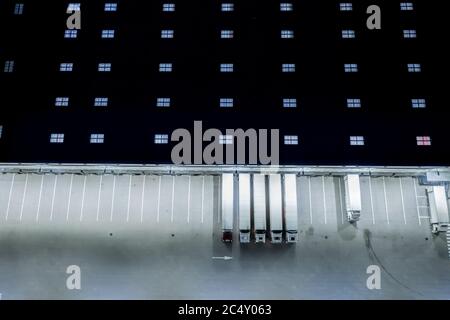 Night Loading dock at a warehouse. modern logistics center. docking ...