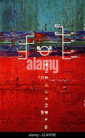 Hull of a bulk carrier ship with draft scale, industrial transportation ...