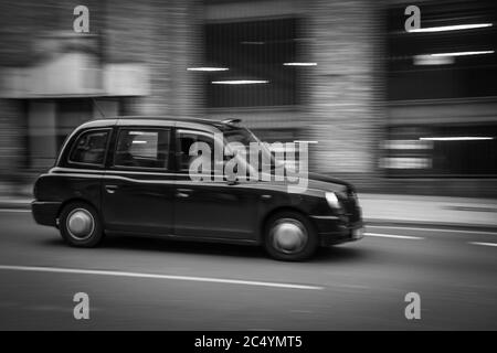 Speeding Taxi Car Fast Driving In City Street. Motion Blur Background ...