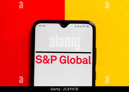 In this photo illustration, a S&P Global logo is seen displayed on a ...