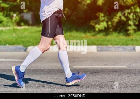 Overweight man running on road - concept of fat man fitness - obese ...
