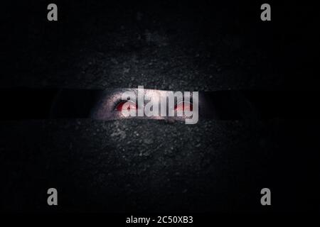 Scary zombie hiding behind the wall with dark background Stock Photo ...