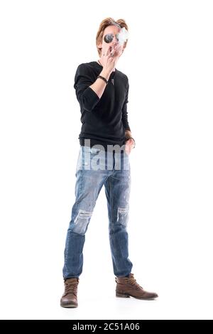 Handsome stylish young man smoking cigarette outside Stock Photo - Alamy