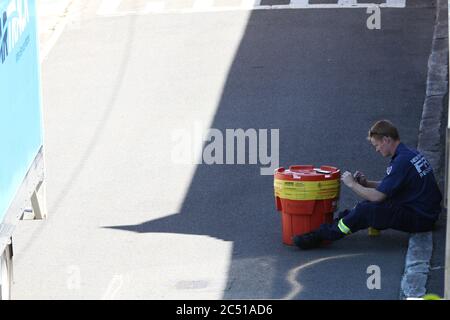 NSW Fire Brigades seal and label the red hazardous materials container ...