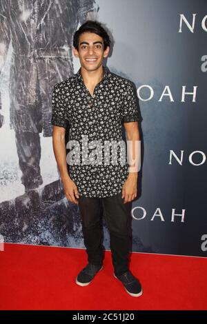 Singer Carmelo Munzone arrives on the red carpet for the Noah premiere ...