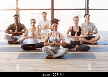 group of people making yoga exercises at studio Stock Photo - Alamy