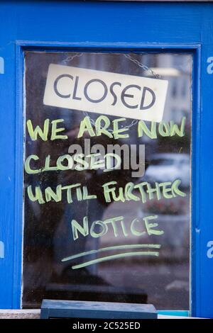 Closed Until Further Notice sign on Bay View Hotel window Stock Photo ...