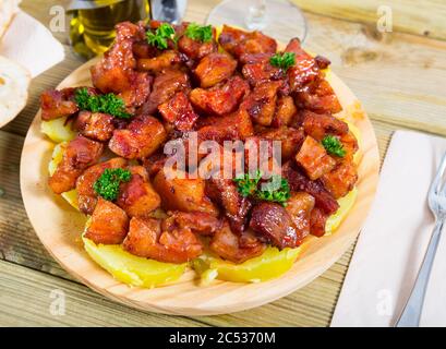 Morro de cerdo a la gallega - spanish dish. Roast nose and cheek pigs ...