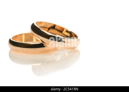 Gold wedding rings for newlyweds on wedding day Stock Photo - Alamy