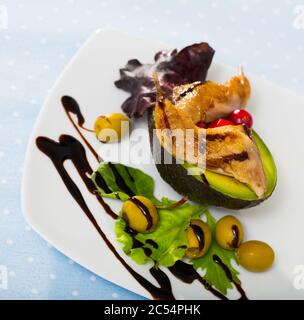 Tasty fried legs of quail served with vegetables and balsamic pasta ...