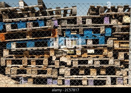 wooden pallet overlap in warehouse Stock Photo - Alamy