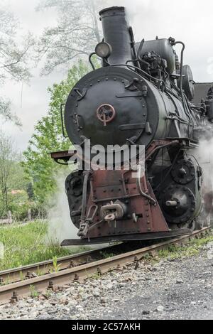 runaway train.old locomotive steam powered Stock Photo - Alamy