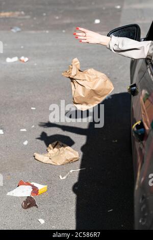 Throwing Garbage On Road