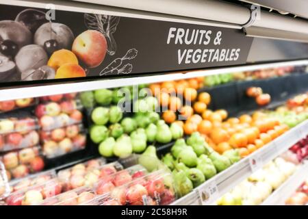 Fruits and Vegetable signage at supermarket produced food section with ...