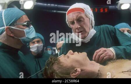 MALCOLM MCDOWELL, BRITANNIA HOSPITAL, 1982 Stock Photo - Alamy
