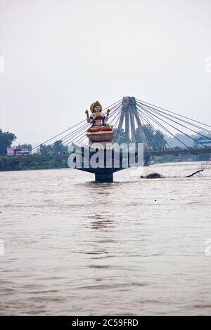 Goddess Ganga statue in a river, Ganges River, Haridwar, Uttarakhand ...