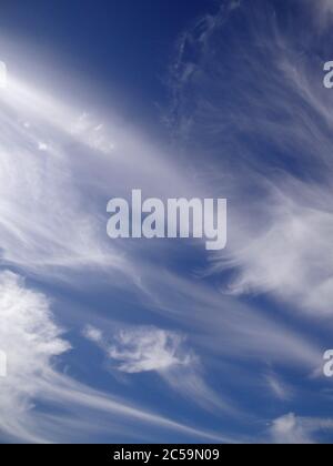 Beautiful blue sky with strange clouds, background Stock Photo - Alamy