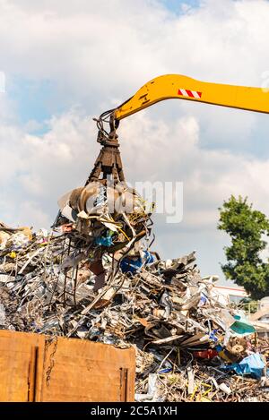 Close-up of a crane for recycling metallic waste Stock Photo - Alamy