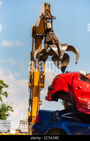Close-up of a crane for recycling metallic waste Stock Photo - Alamy