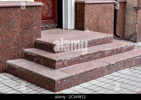 brick threshold with granite steps to the front door, close-up of the ...