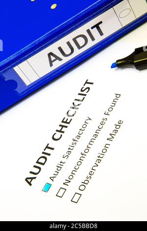Audit checklist, with tick against "audit satisfactory Stock Photo - Alamy