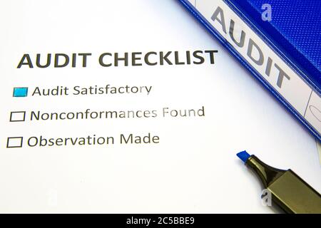 Audit checklist, with tick against "audit satisfactory Stock Photo - Alamy