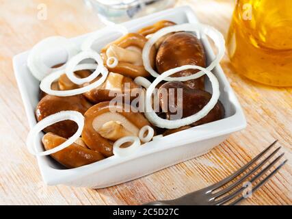 Pickled mushrooms shiitake with onions closeup Stock Photo - Alamy