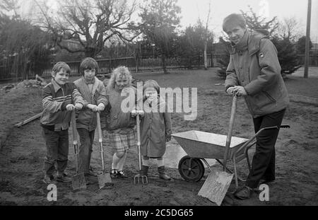 SPADES IN A WHEELBARROW Stock Photo - Alamy