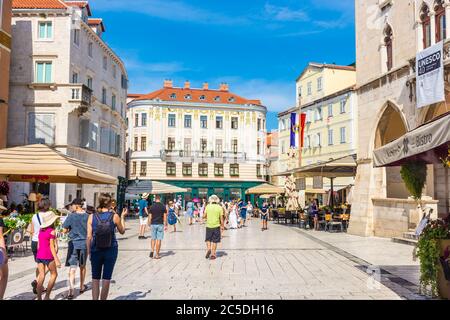 SPLIT, CROATIA, 7 AUGUST 2019: Tourists in the central square of Split ...