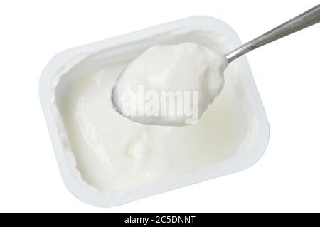 yogurt scooping on spoon from plastic cup Stock Photo - Alamy