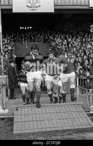 Llanelli captain Roy 'Shunto' Thomas holds the WRU Cup aloft after ...