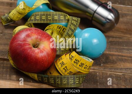 Weight control concept, with measure objects, and exercise weight, with ...