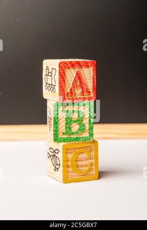 ABC blocks arranged in stack, education and kids background Stock Photo ...