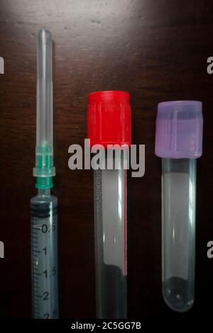 blood taking kit, empty syringe with needle, blood collection tube and ...