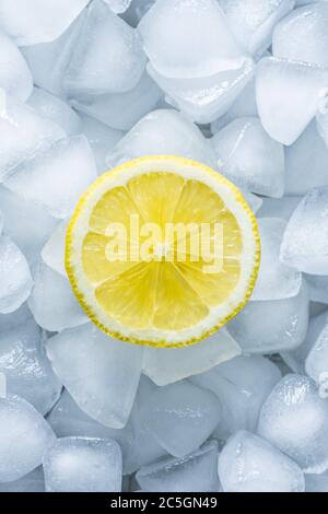 top view of cocktail with lemon, ice cubes and mint in glass Stock ...