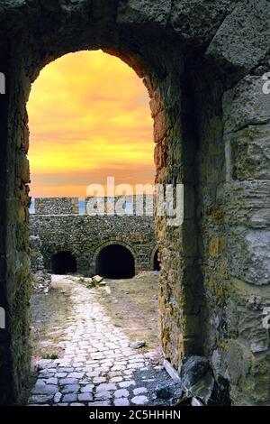 Fortress of Neokastro in Pylos at sunset time, Messinia, Greece Stock ...