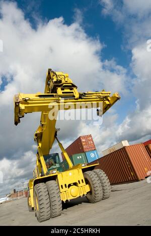 CVS Ferrari reach stacker and terminal tractor being used to move ...