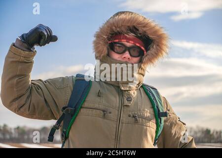 Polar men looks forward against a blue winter sky Stock Photo - Alamy