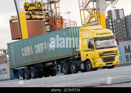 Freightliner lorry loaded with a shipping container at Manchester ...