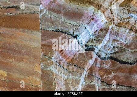 Colorful sedimentary rocks at Nanguluwurr aboriginal rock art site ...