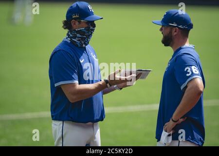 Kansas City Royals catcher Cam Gallagher adjusts his mask prior to a ...
