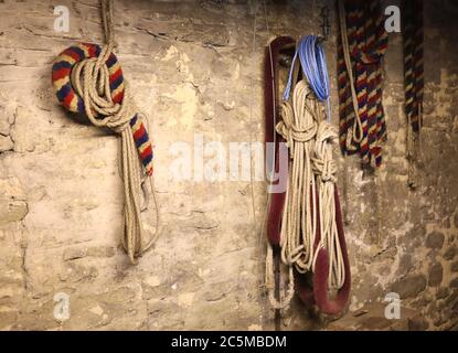Two churches next to each other on small cobbled plaza in town center ...