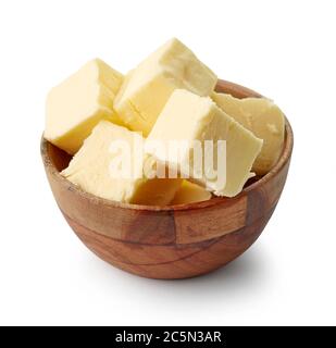 Butter Margarine block in a wooden tray with herbs. White wooden ...