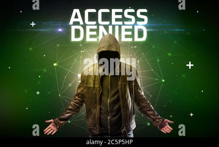 Mysterious hacker with ACCESS DENIED inscription, online attack concept ...