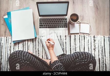 Workplace at home with laptop and papers Stock Photo - Alamy