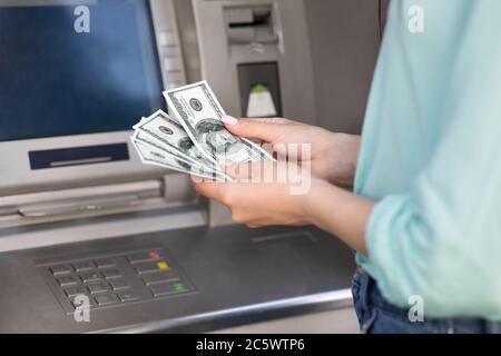 Female hands counting money near laptop at the desk Stock Photo - Alamy