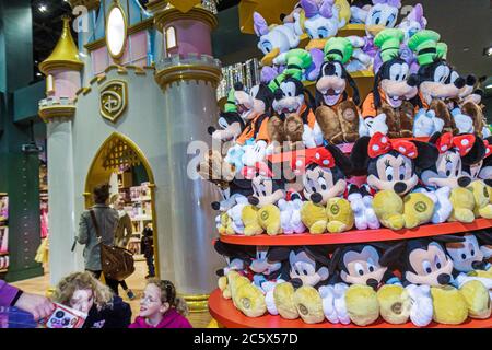 Female tourist with Mickey and Minnie Mouse characters, Times Square ...