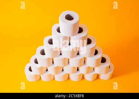 Pyramid created from white toilet paper rolls Stock Photo - Alamy