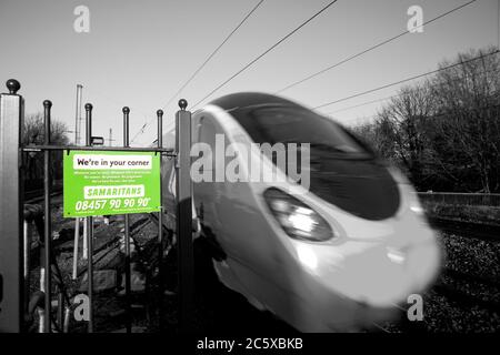 Samaritans poster by a railway line, part of the small talk saves lives ...