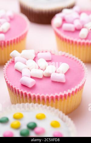 A top view of a nicely decorated white plate of whole and sliced lemons ...
